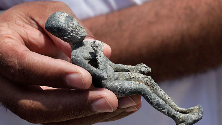 Archaeologists stumble on rare statue of Egyptian god Pataikos