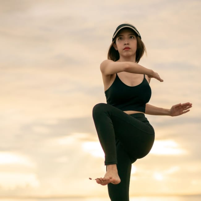 4 Simple Standing Exercises Trainers Say Can ‘Seriously’ Sculpt Your Core