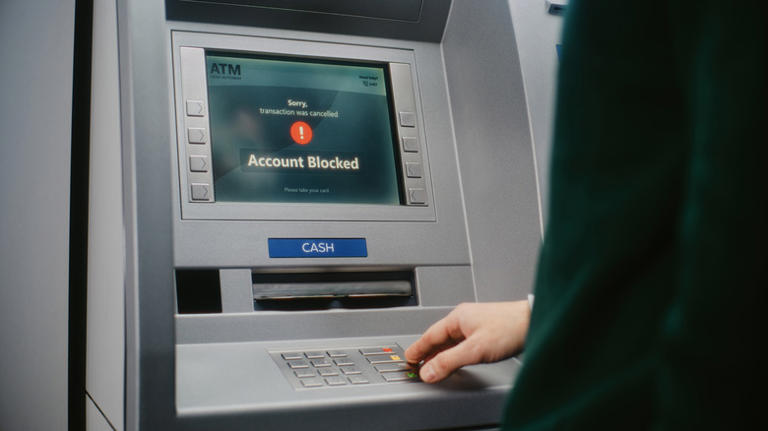 Avoid This Crucial Mistake If Your Bank Card Gets Stuck In An ATM Machine