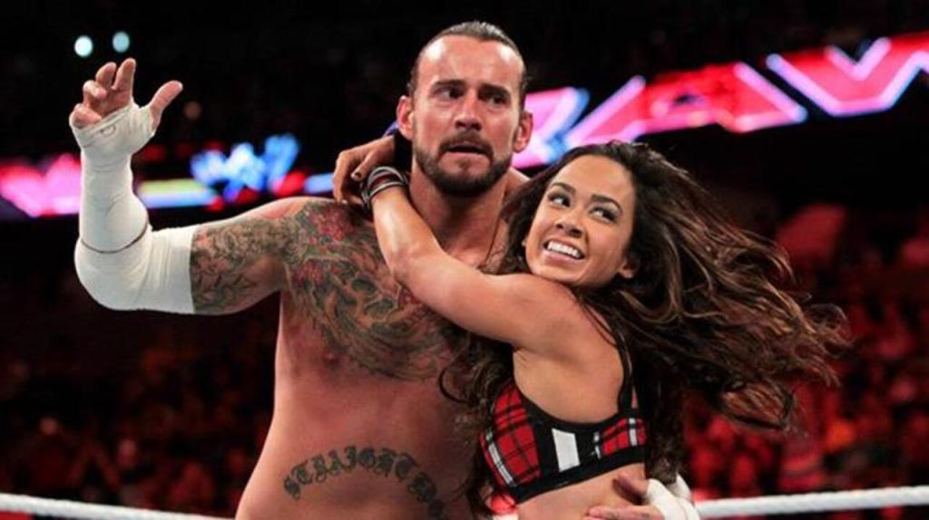 CM Punk reveals what AJ Lee did while he cried over the Chicago Cubs ...