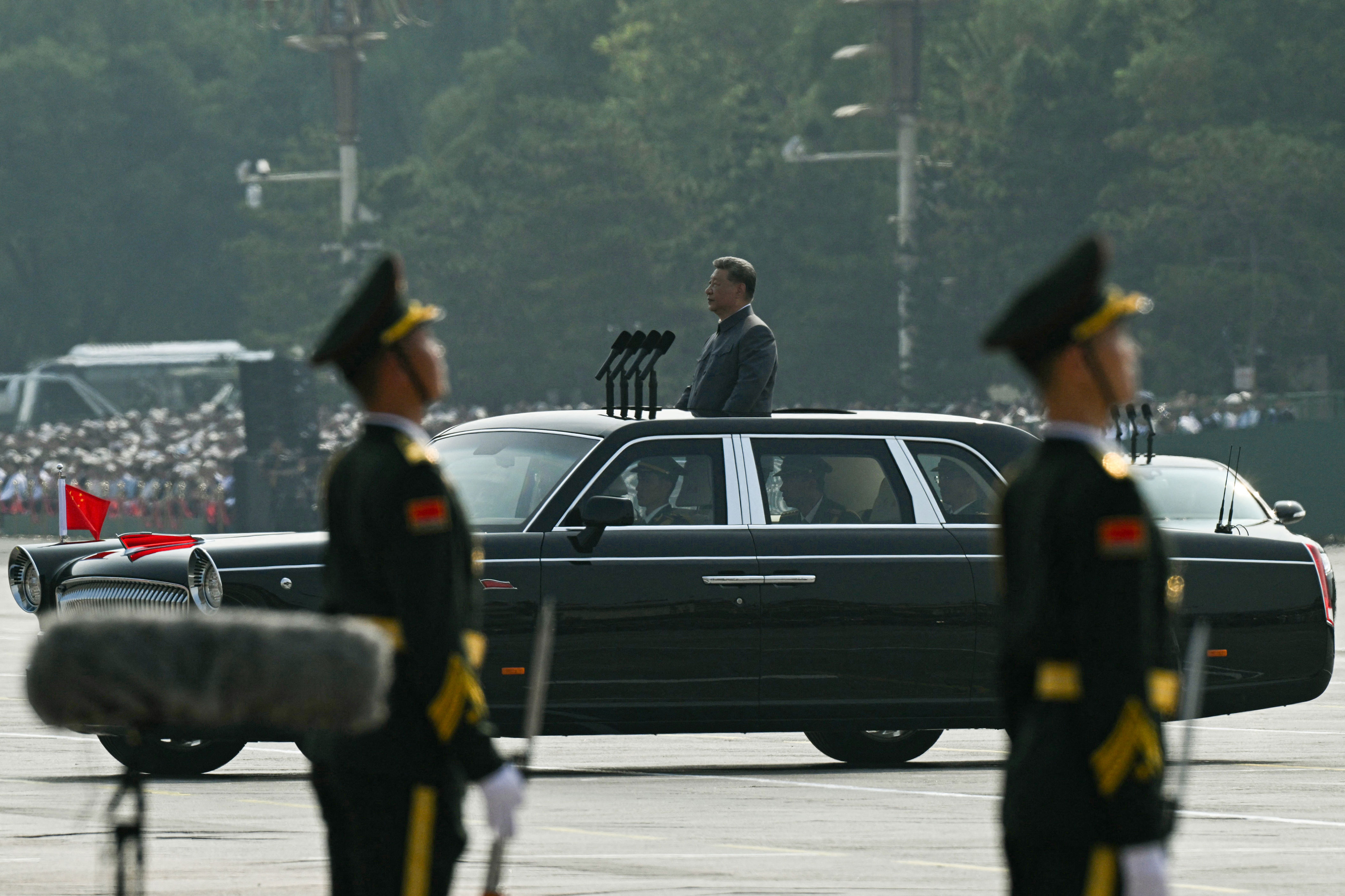 China’s Xi, flanked by Putin and Kim, shows off ‘new generation’ weapons