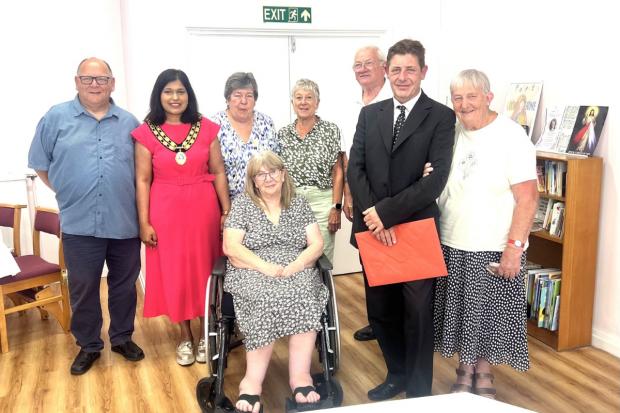 Community champion honoured at thank-you event for services