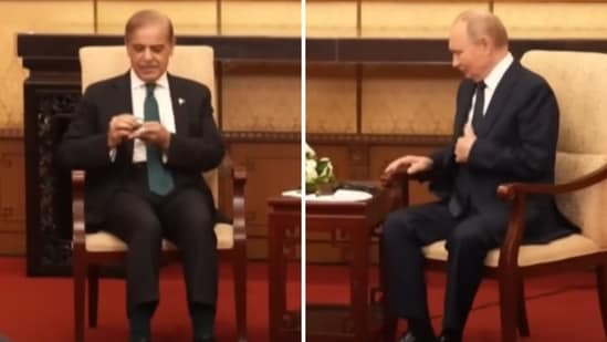 Pakistan PM Shehbaz Sharif fumbles with headset while meeting Vladimir ...