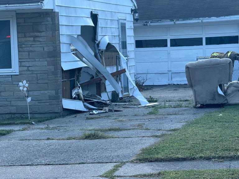 2 hospitalized; Major crash involving car, motorcycle and home in Dayton