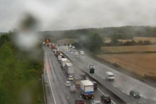 Person injured after car crashes into bush on M25 causing severe delays