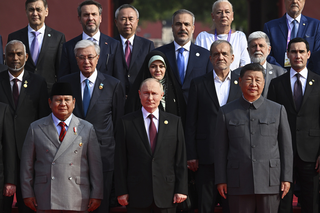 A look at the world leaders joining China's military parade in a show ...
