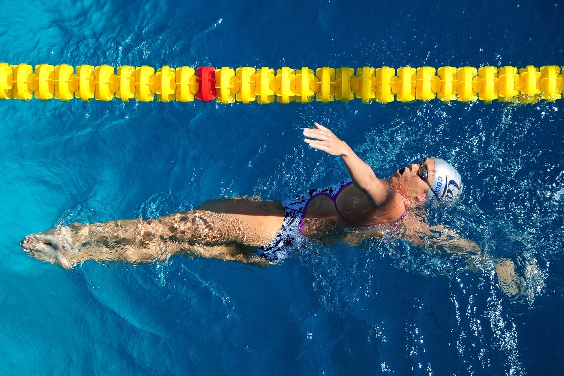 Standout photos of American Olympic icon and SI Swim model Natalie Coughlin