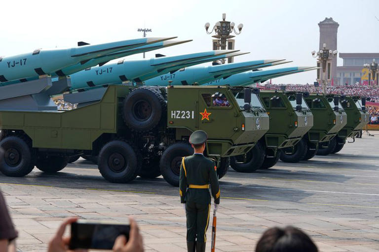 China shows off new missiles, drones and fighter jets in massive ...