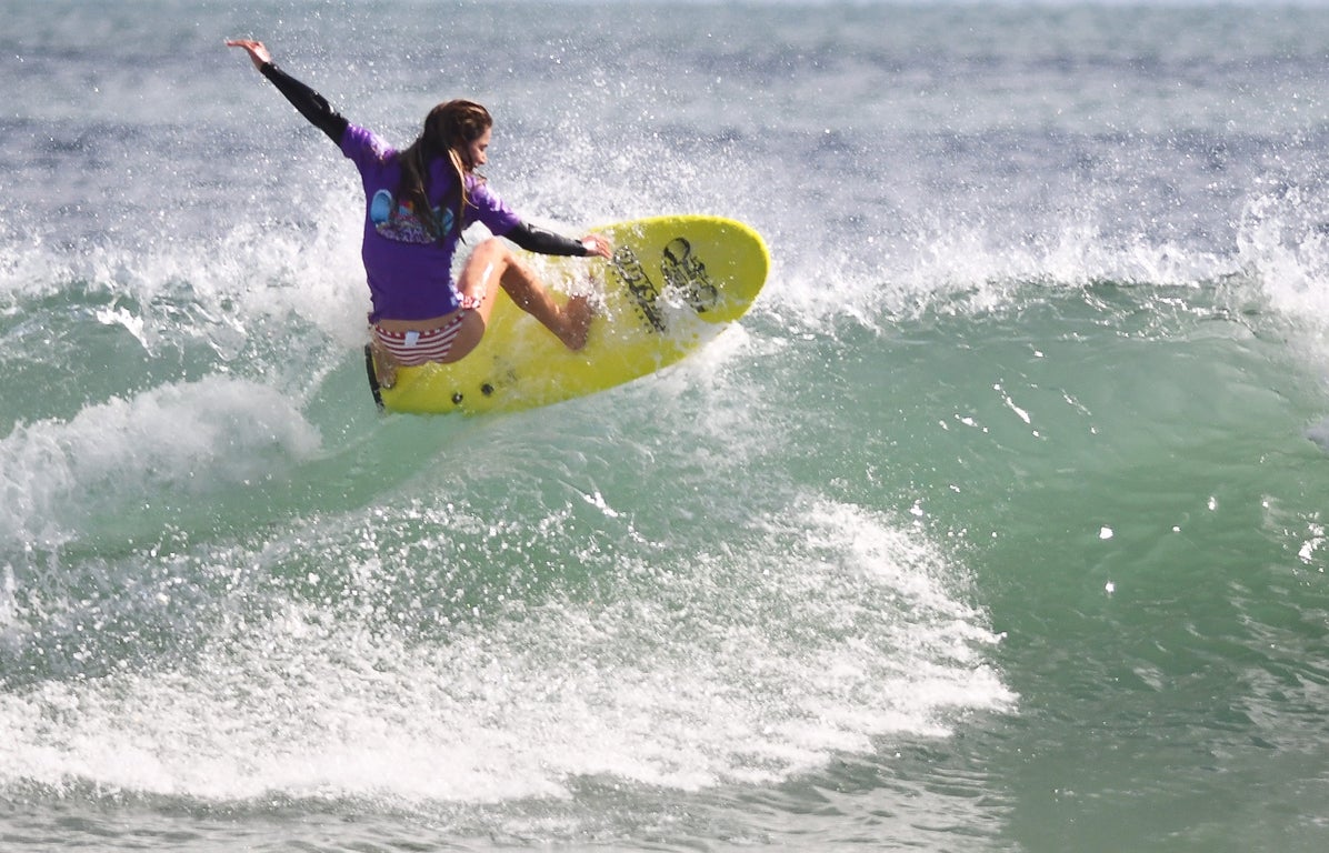 Fantastic photos feature Olympic surfer and SI model Caroline Marks