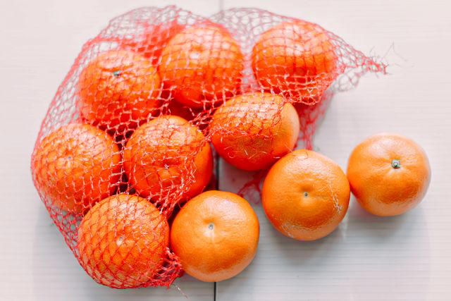 The Real Reason Oranges Come in a Red Mesh Bag