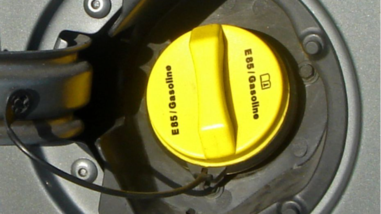Why some cars have yellow gas caps — and what they indicate