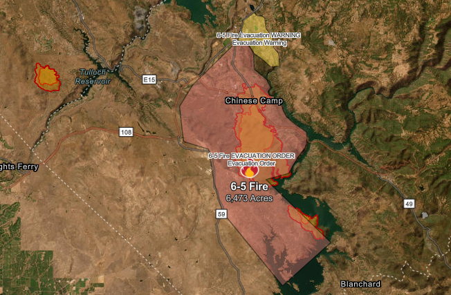 Lightning-caused wildfire prompts evacuations, burns historic ...