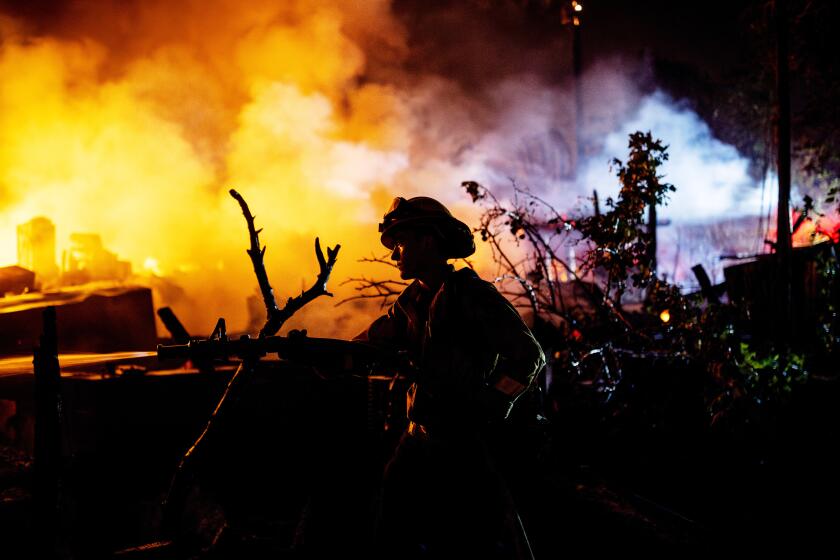 Wildfire burns into historic California Gold Rush of Chinese Camp as well as old mining town