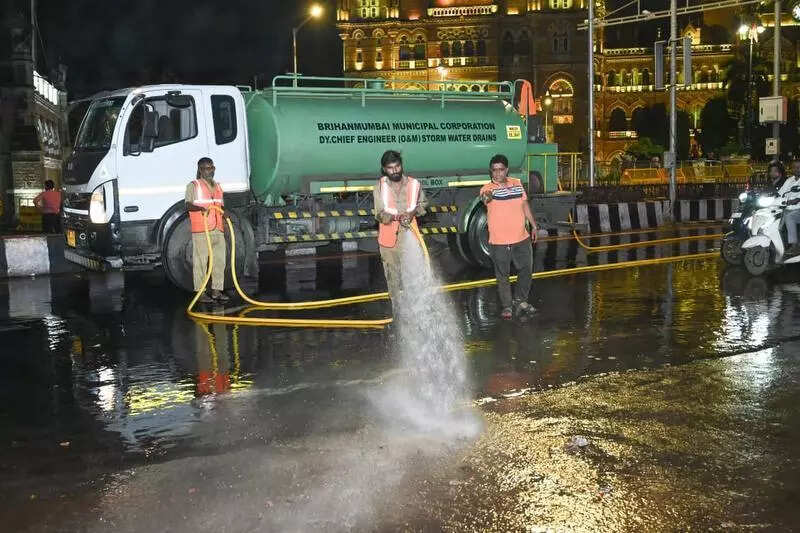 BMC sanitation workers collect 30,000 sealed water bottles, clean Azad ...