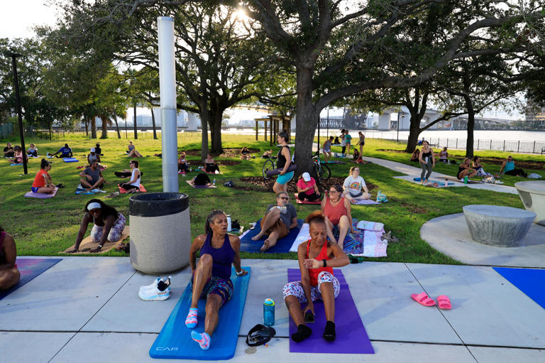 Bending, breathing, belonging: Yoga unites hundreds at Friendship ...