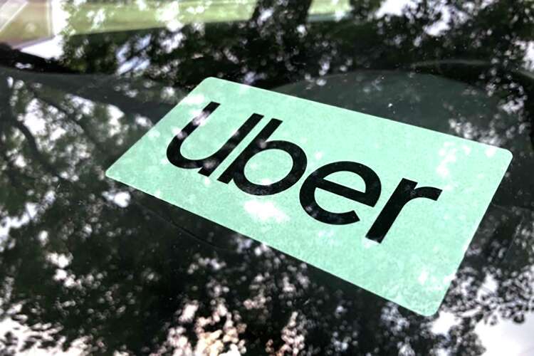 Uber riders can now pay with cash - here's how it works