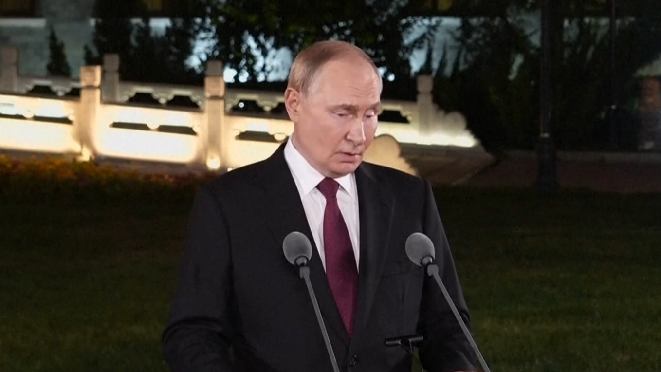 Xi Jinping and Vladimir Putin talk immortality at Beijing parade