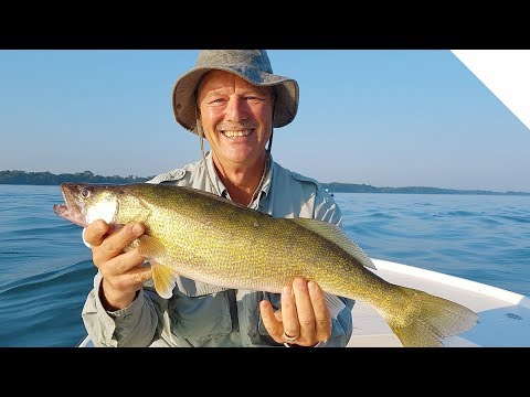 Deep water jigging for walleye along a break