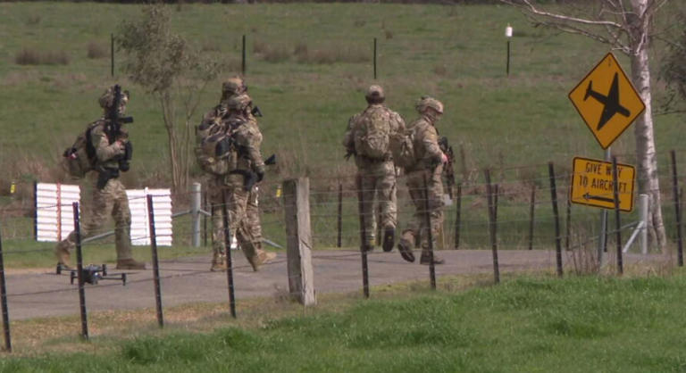 Bearcat spotted as police operation unfolds in manhunt for accused cop ...