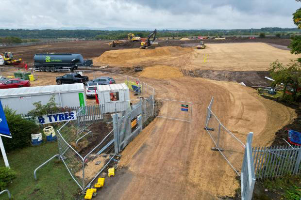 Drone pictures reveal progress at new Amazon warehouse as land cleared