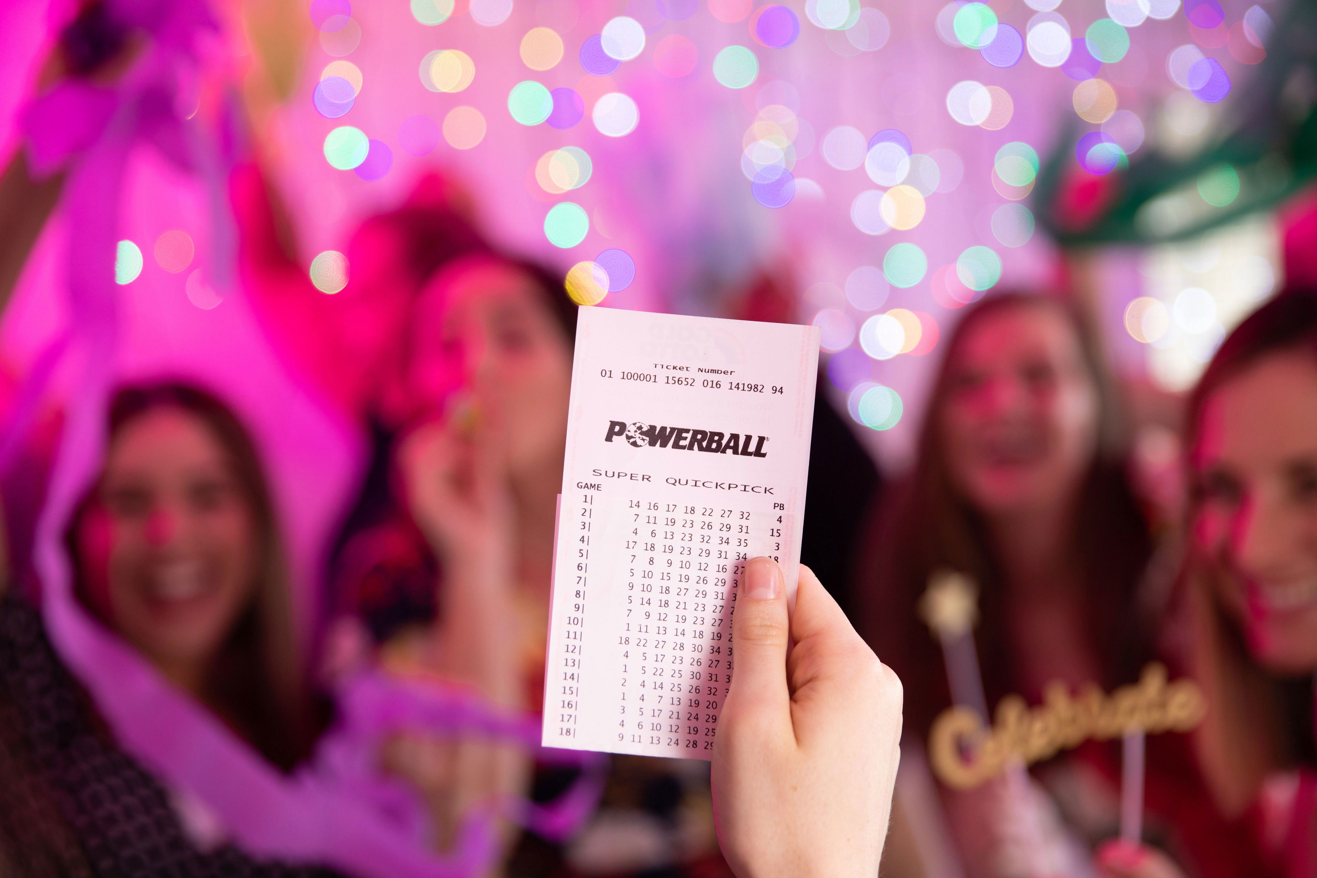 Screams and laughter as four winners split $80 million Powerball jackpot