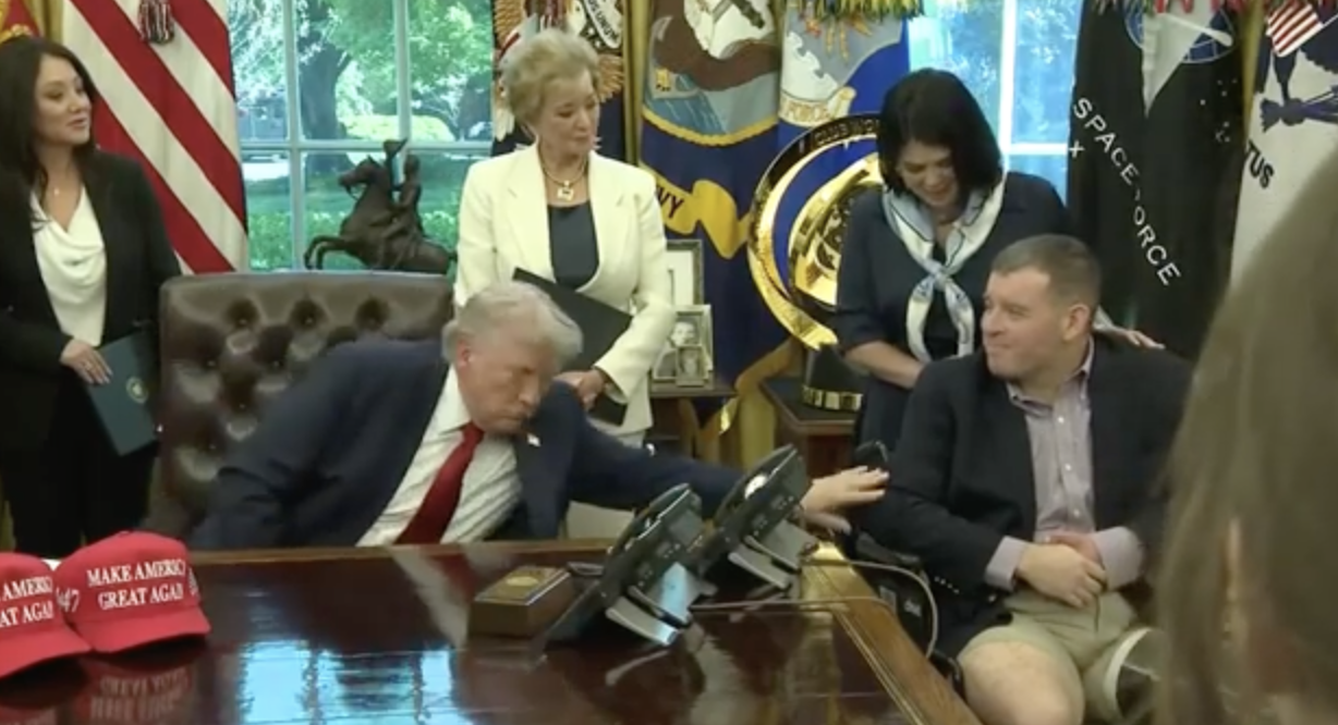'Let's Go Brandon': Trump Slaps Arm Of Wounded Veteran While Insulting ...