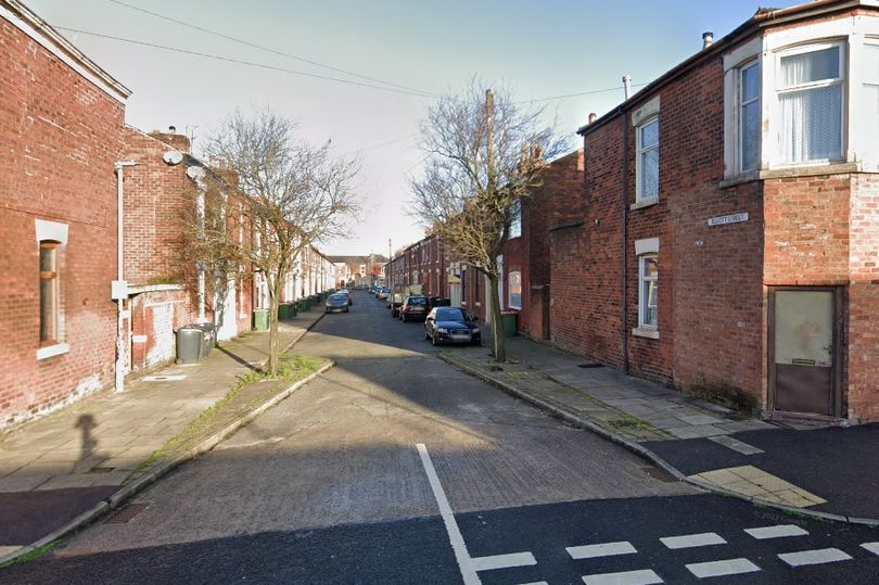 Woman found with slash injuries and Preston street cordoned off