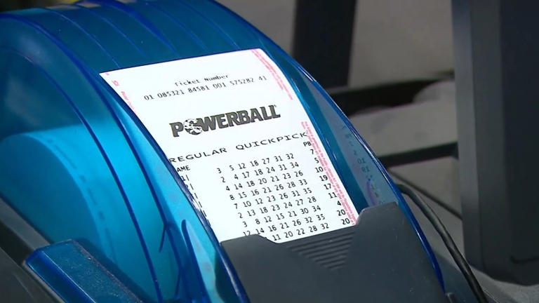 Screams and laughter as four winners split $80 million Powerball jackpot