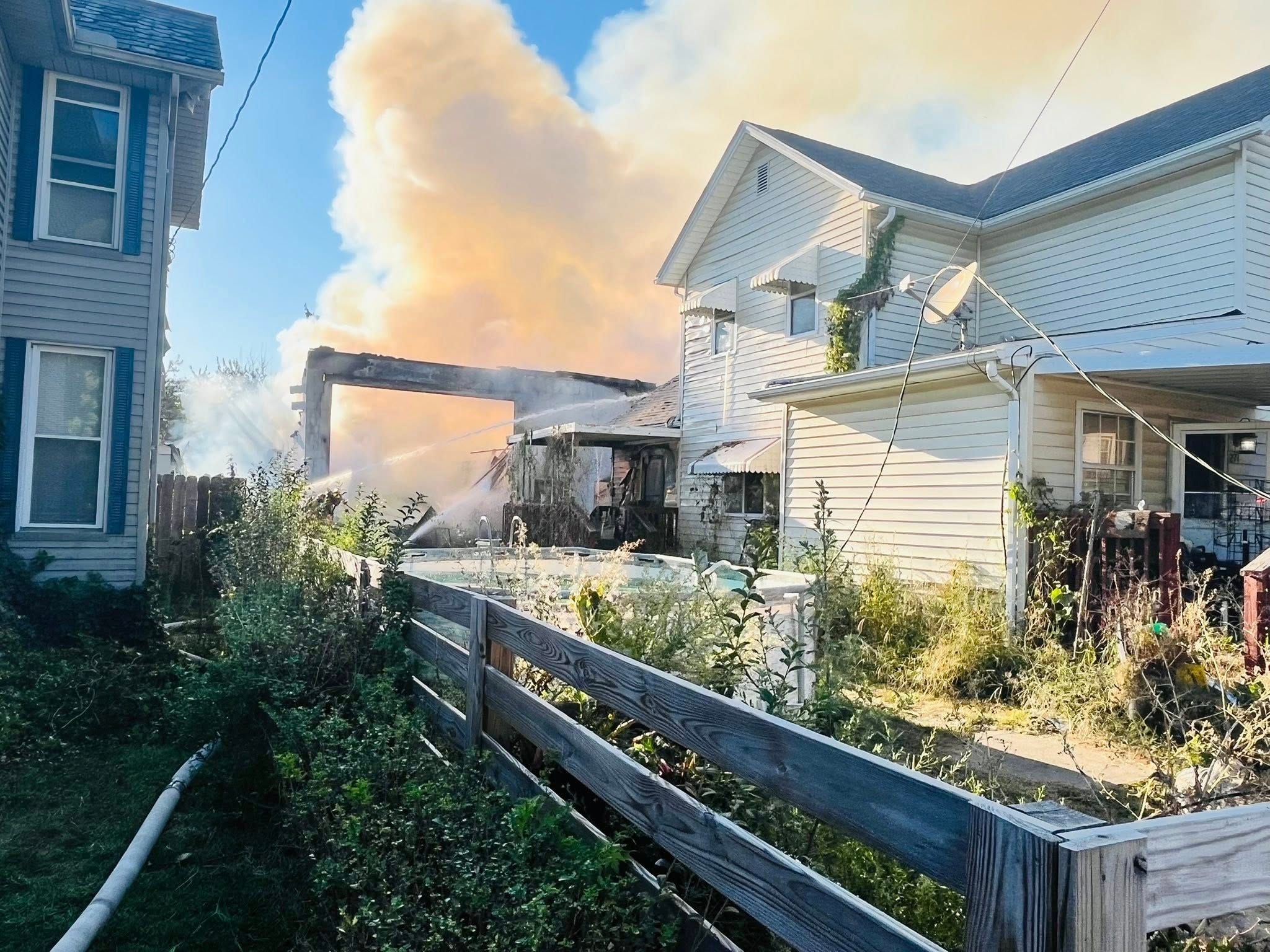 Two residents, firefighter suffer injuries in Newark garage fire but ...