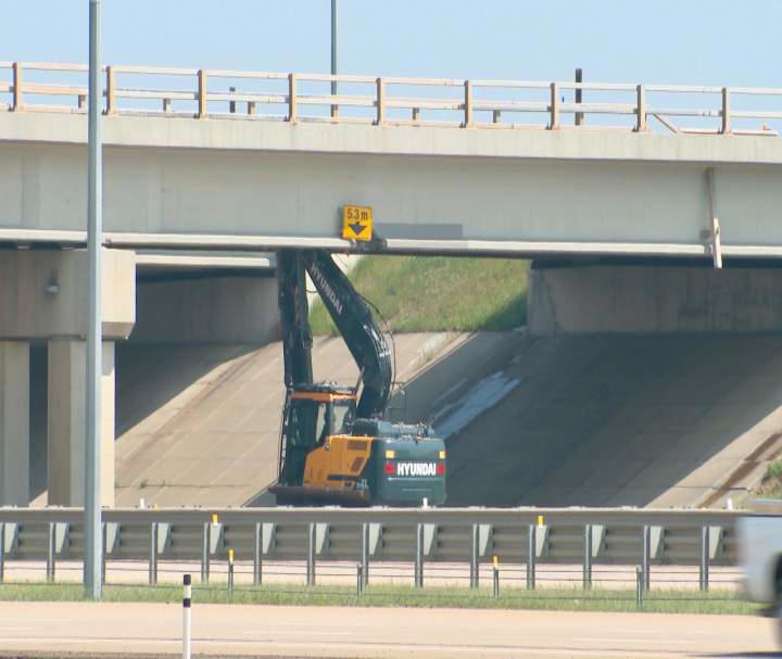 Excavator on trailer hits Whitemud Drive overpass — again