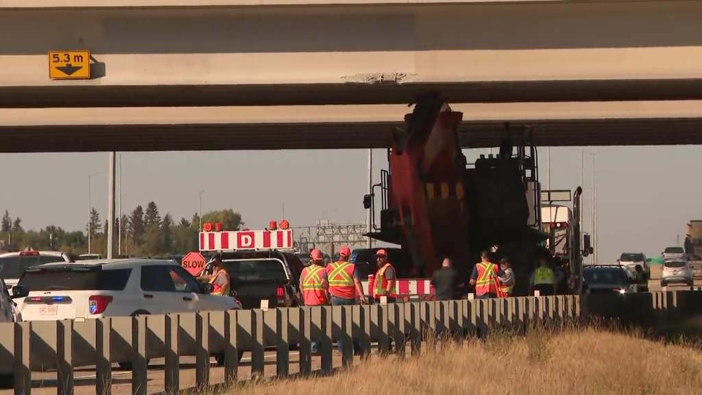 Excavator on trailer hits Whitemud Drive overpass — again