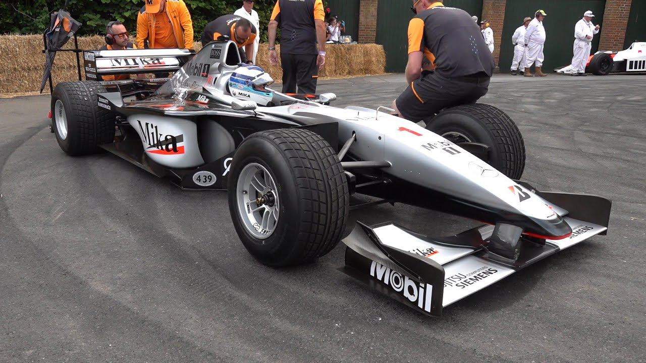 Mika Hakkinen Driving 1999 McLaren MP4/14 at Goodwood Festival of Speed