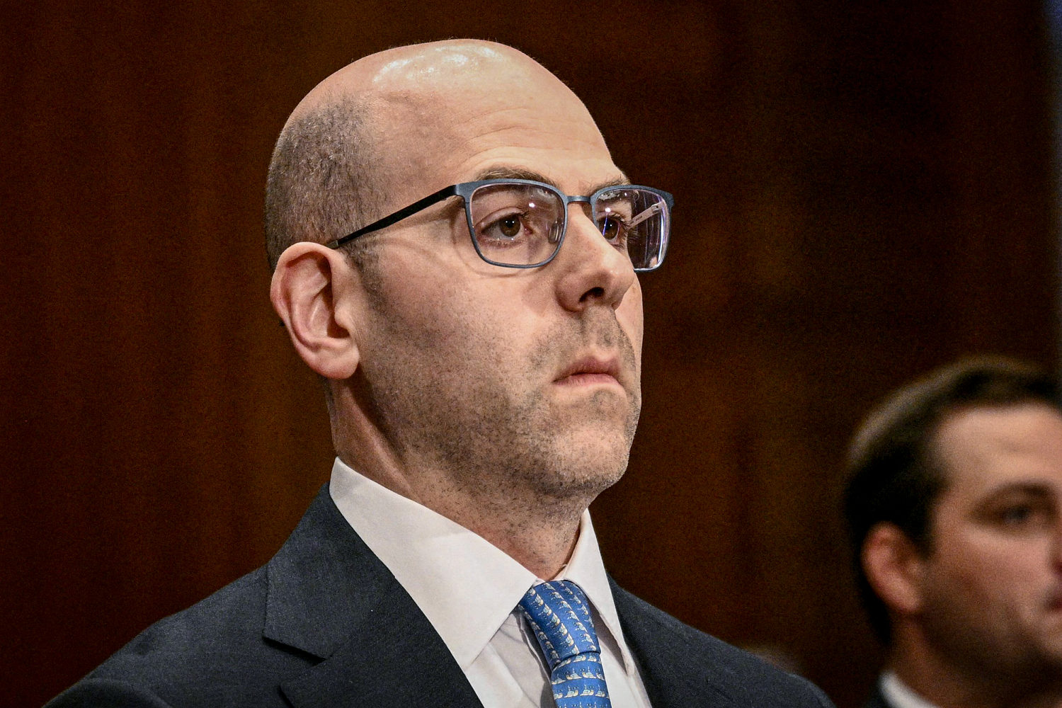 Trump nominee plans to keep White House job if he's confirmed for Fed post