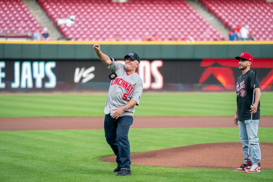 RPD Officer Denny Wright throws first pitch at Reds game