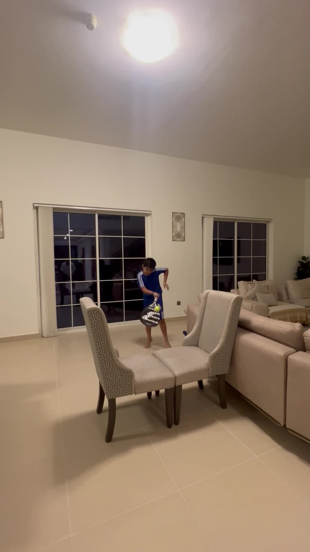 Creative Indoor Padel Game in the Living Room