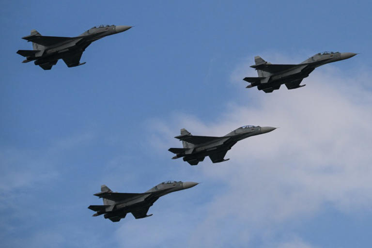 Two Venezuelan military aircraft flew over US Navy ship in ‘highly ...