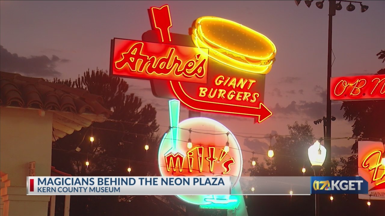 Magicians are behind Neon Plaza signs at Kern County Museum