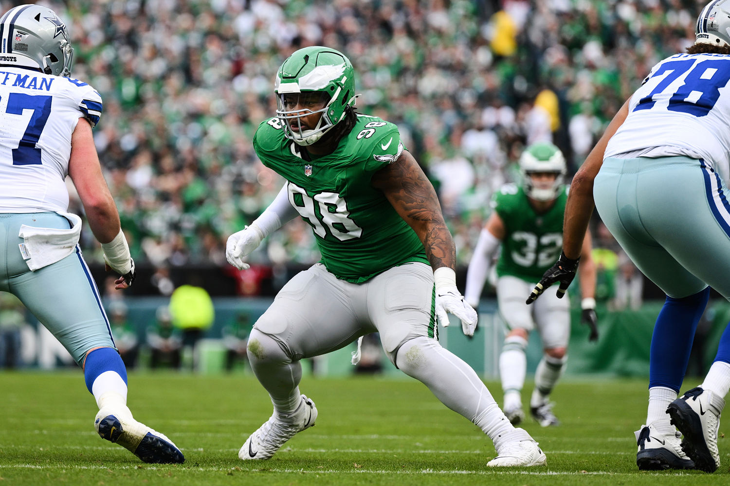 Eagles star Jalen Carter is ejected after opening kickoff for spitting on Dak Prescott