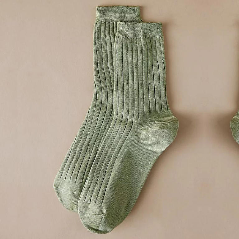 Olivia Colman's sage green ensemble is getting us in the mood for ...
