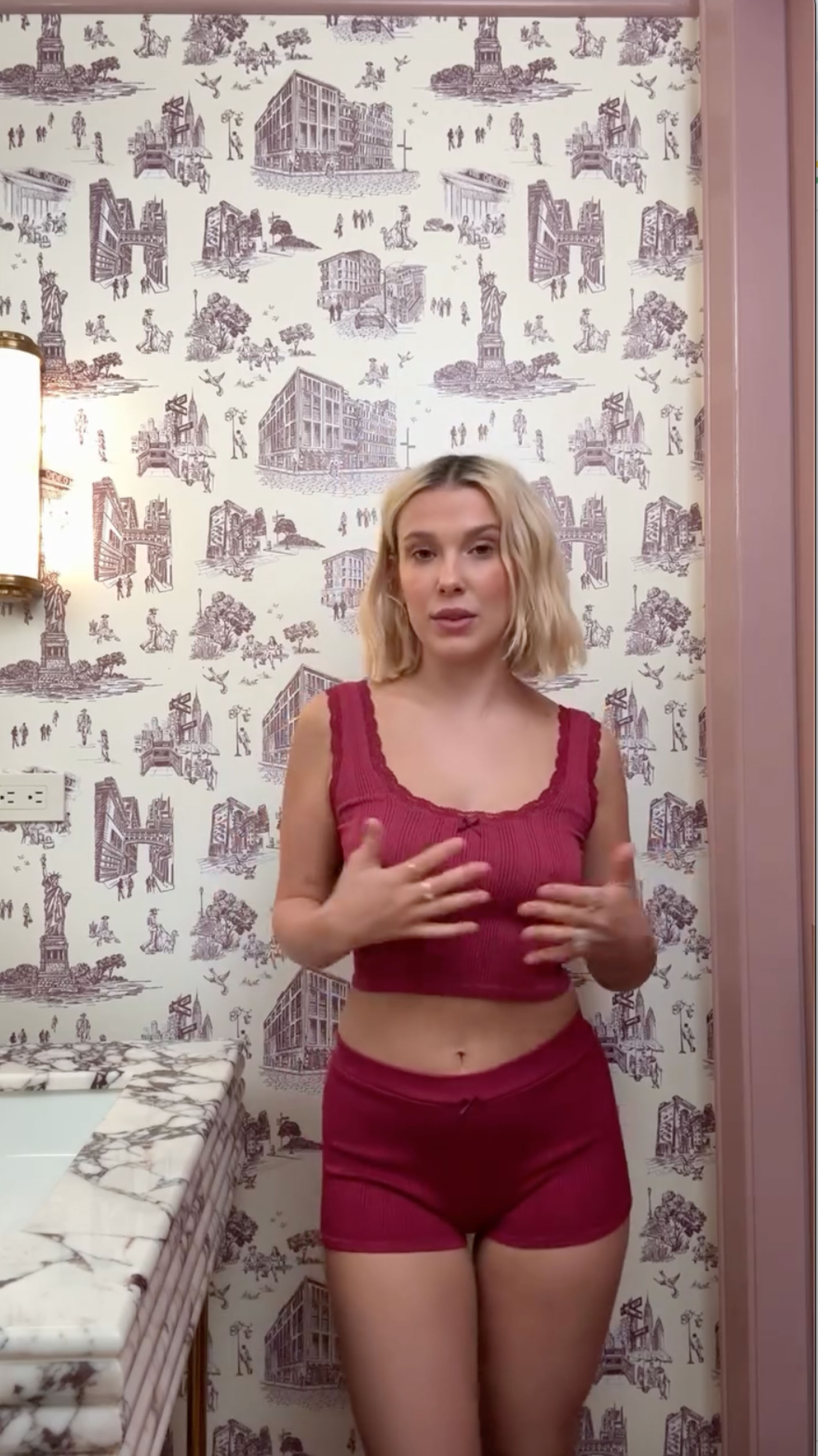 Millie Bobby Brown leaves little to the imagination in cherry pajama set after becoming a mom