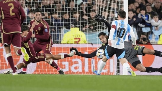 Lionel Messi drops goalkeeper, defender on ground with chip, adds tap ...