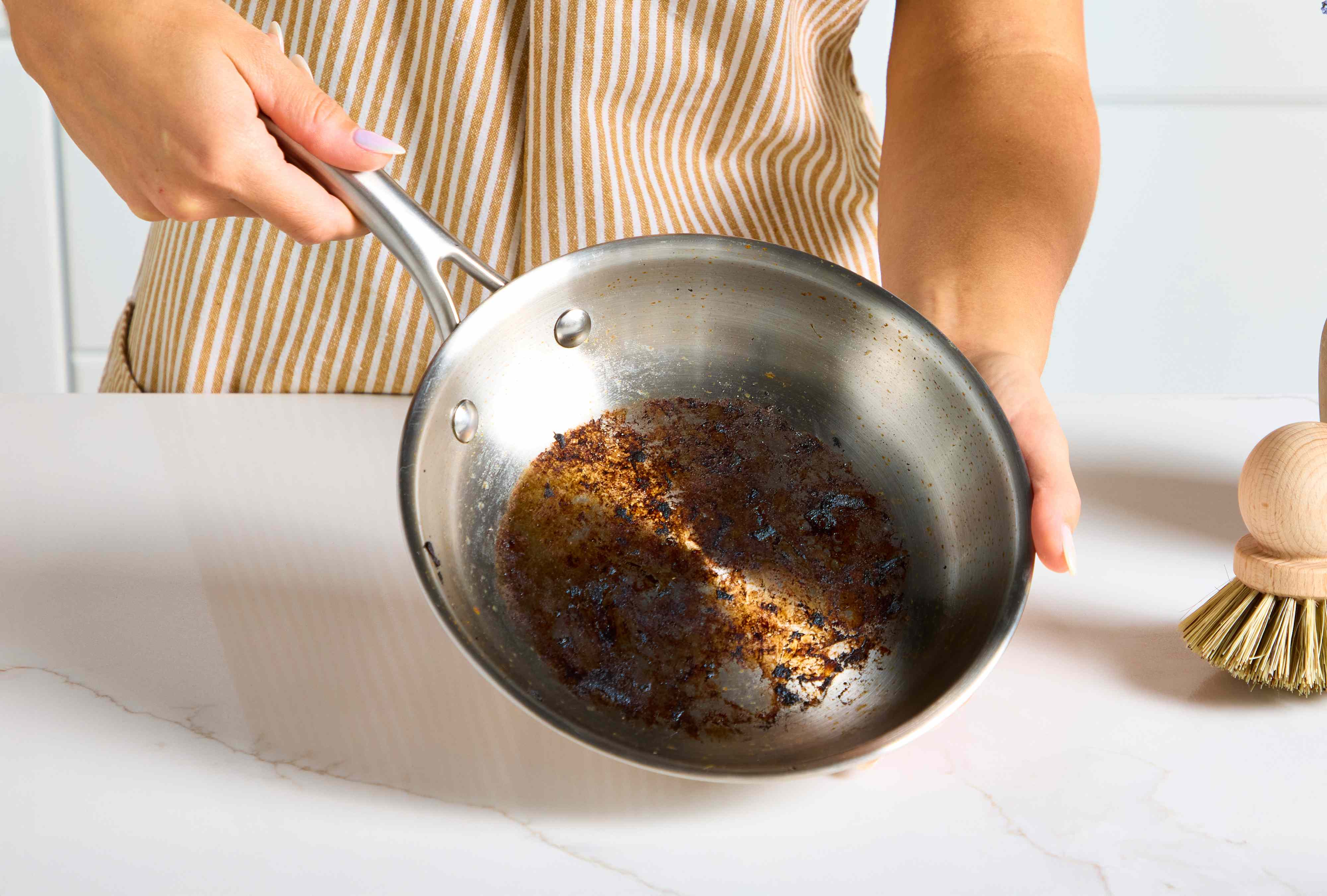 How to Clean a Burnt Pan Fast and Finally Get That Layer of Grime Off, According to Cleaners