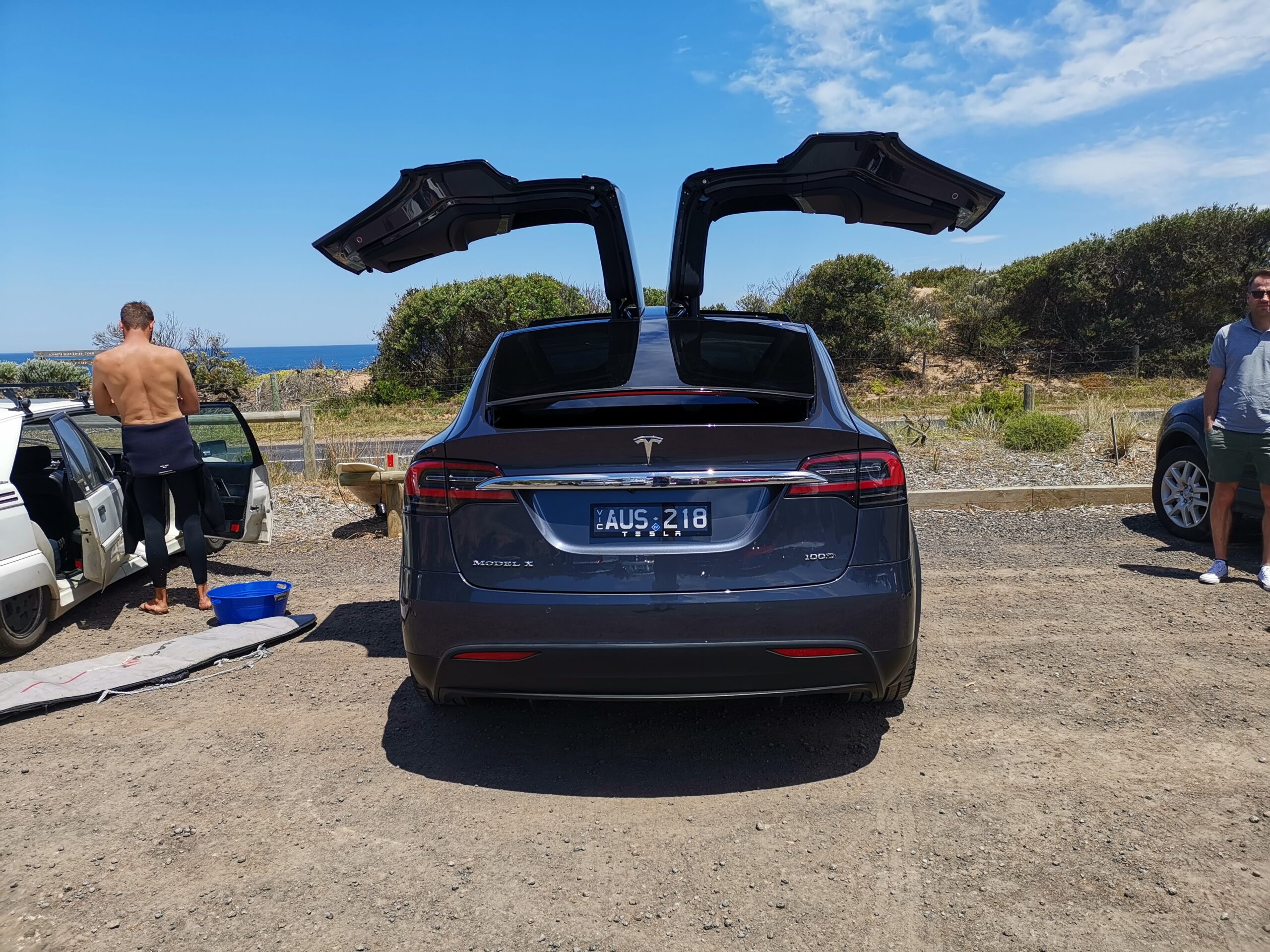 How should Tesla's Cybercab Robotaxi doors open?
