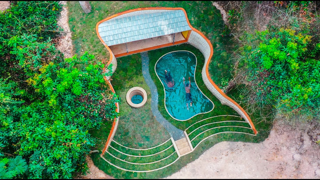 This hand-built underground hut looks priceless beside modern luxury ...