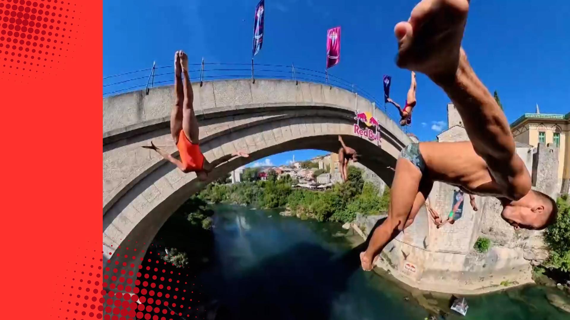 When cliff diving and skydiving powerfully combine off the iconic Stari ...