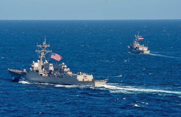 Caribbean war fears grow as Venezuelan fighter jets fly over US warship ...
