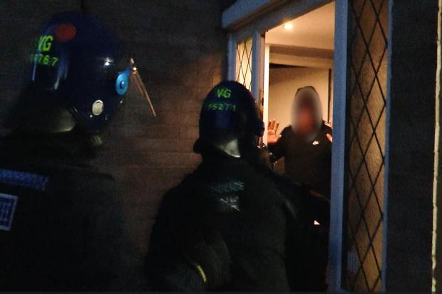 Watch: masked police conduct drugs raid at two Colchester homes