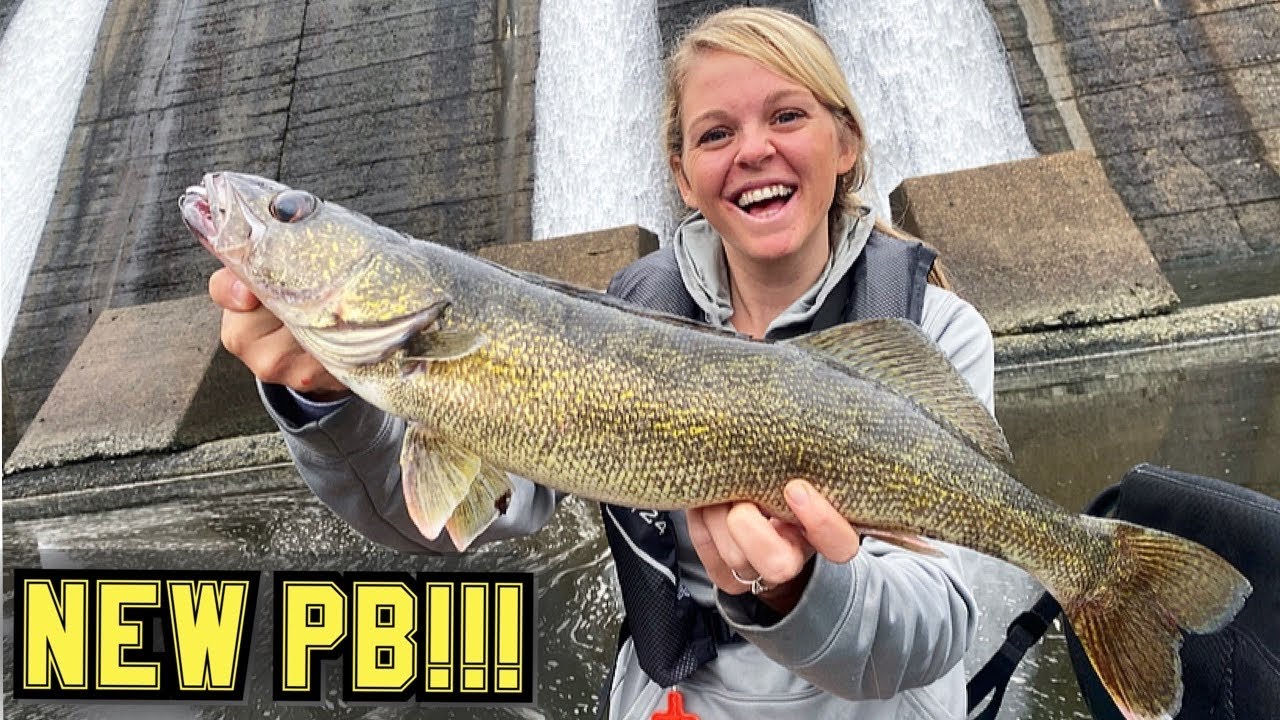 She Lands a Personal Best Walleye Below Giant Spillway