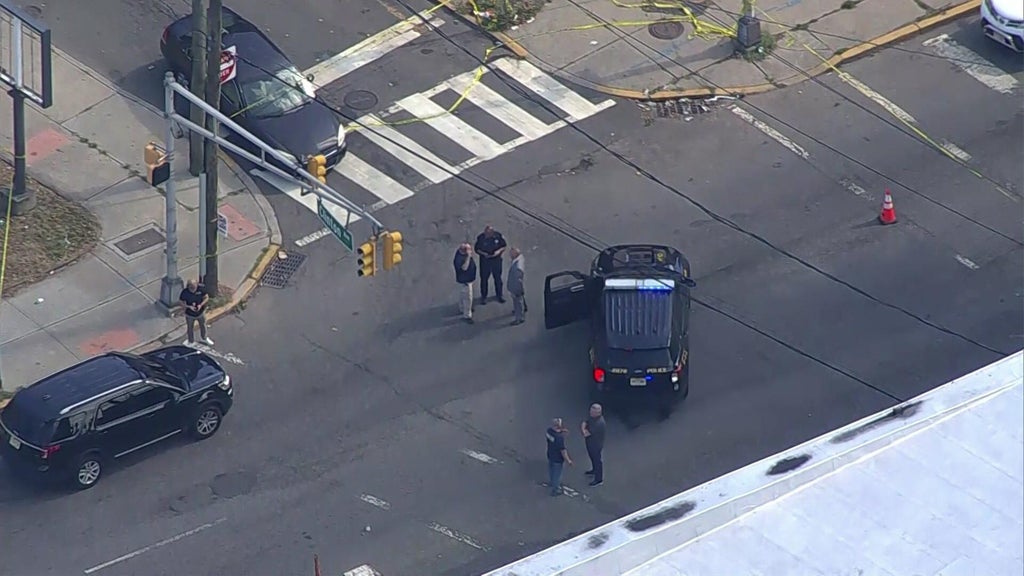 Gunman who opened fire on Jersey City police officers in patrol cars is ...