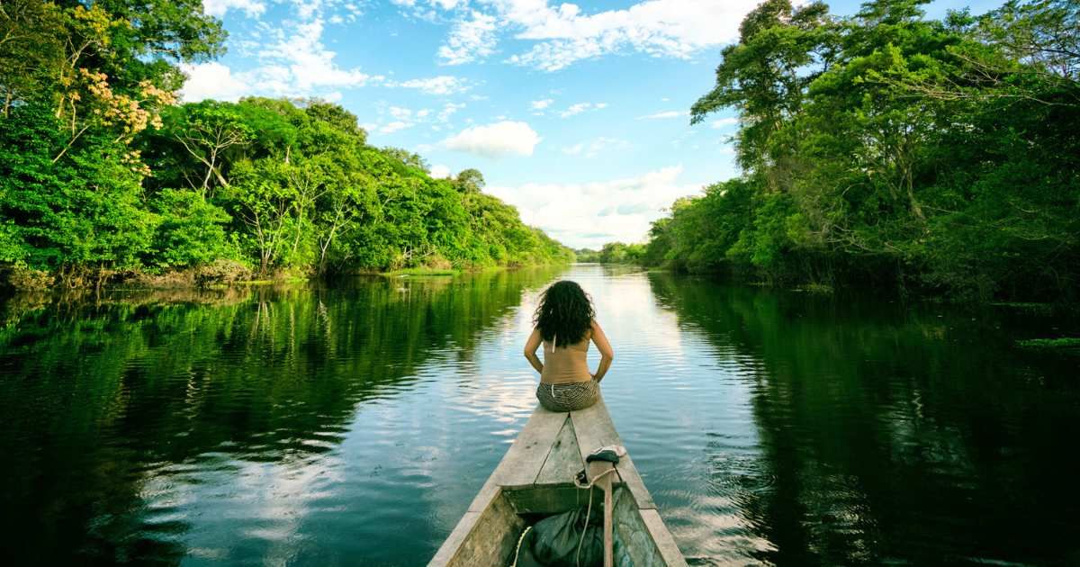 Isolated indigenous tribe, Mashco Piro, seen entering village—raising ...